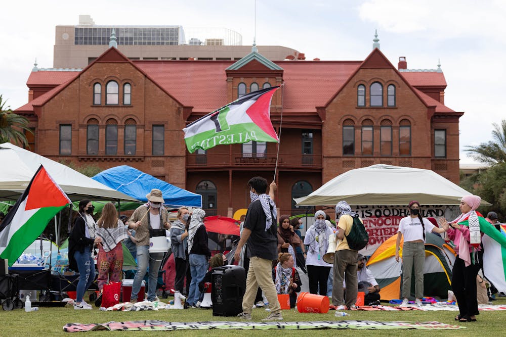 Pro-Palestine protestors set up tents outside of Old Main, three ...