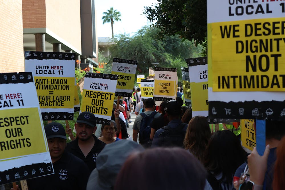 ASU dining hall workers protest over alleged surveillance by management ...
