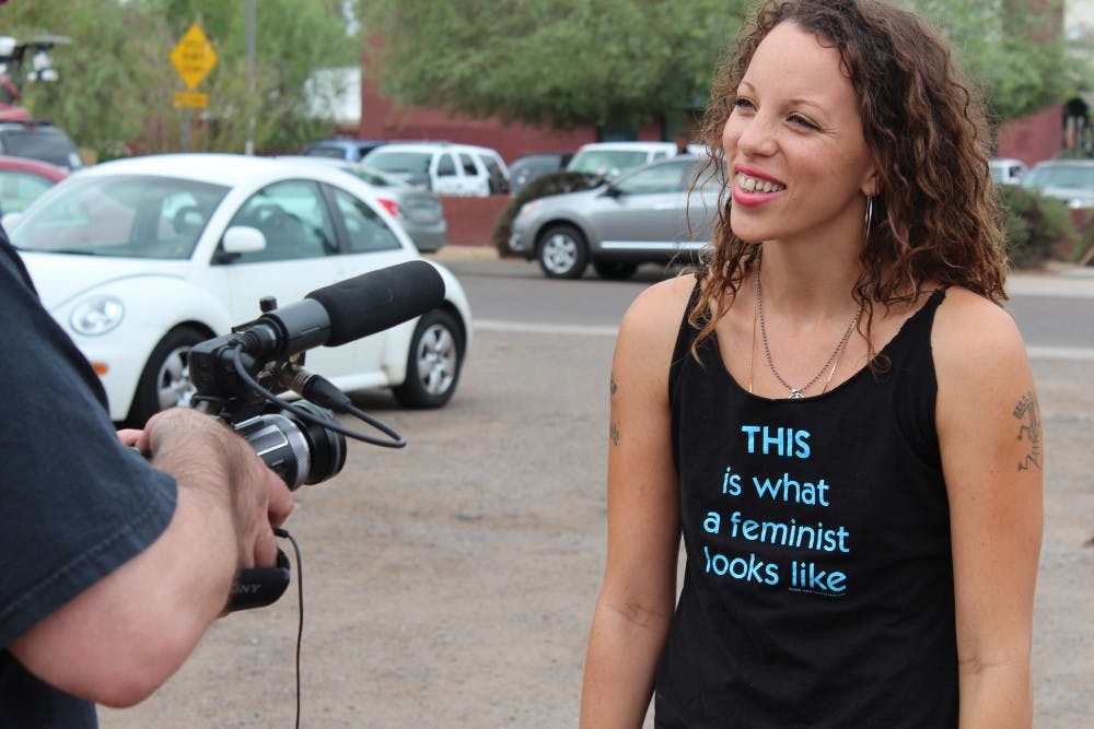 Protesters go topless in support of women's rights - The Arizona State ...