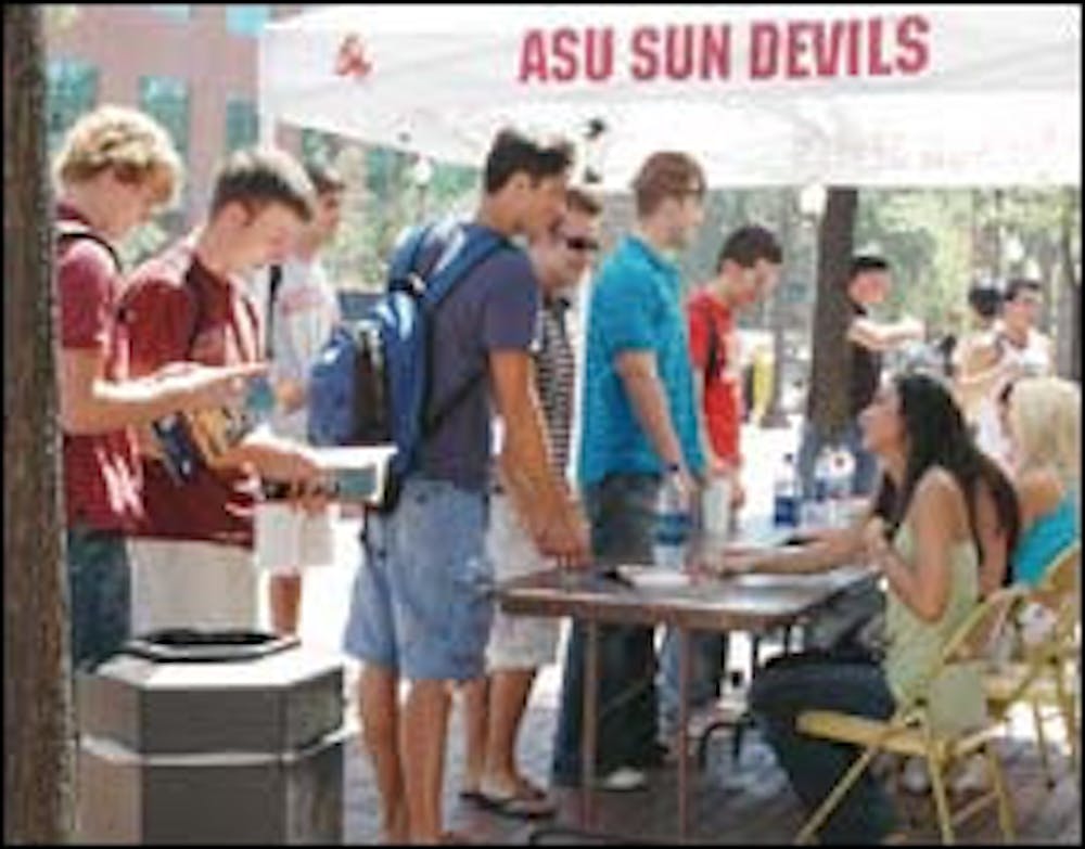 Students pose in Playboy - The Arizona State Press
