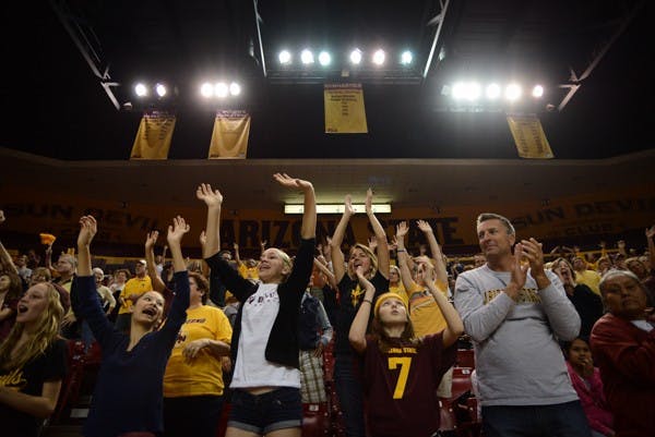 Fans cheer on the Sun Devils at the close of the third set as ASU moved ...