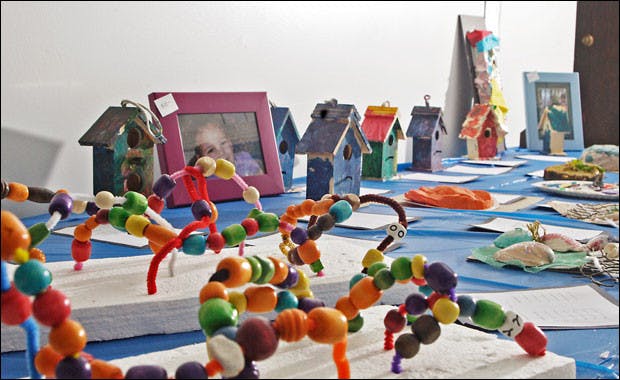 111308-auction - The Arizona State Press