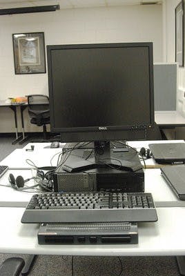 A computer equipped with a Humanware braille keyboard - The Auburn ...