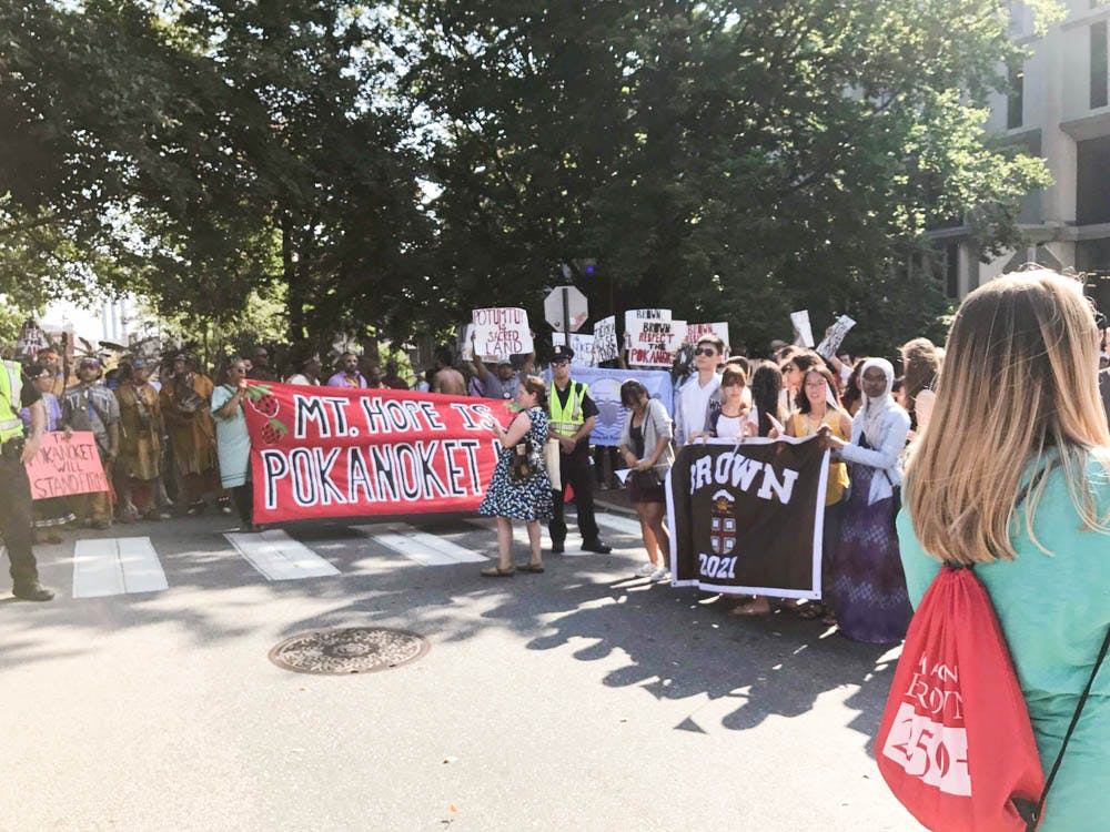 Marching, Pokanoket demand U. return land - The Brown Daily Herald