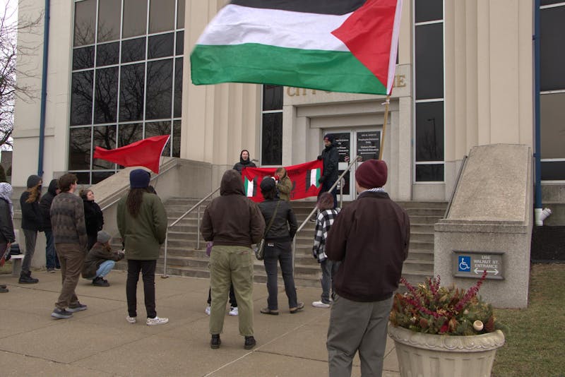 Protesters gather in front of Muncie City Hall, condemning the U.S ...