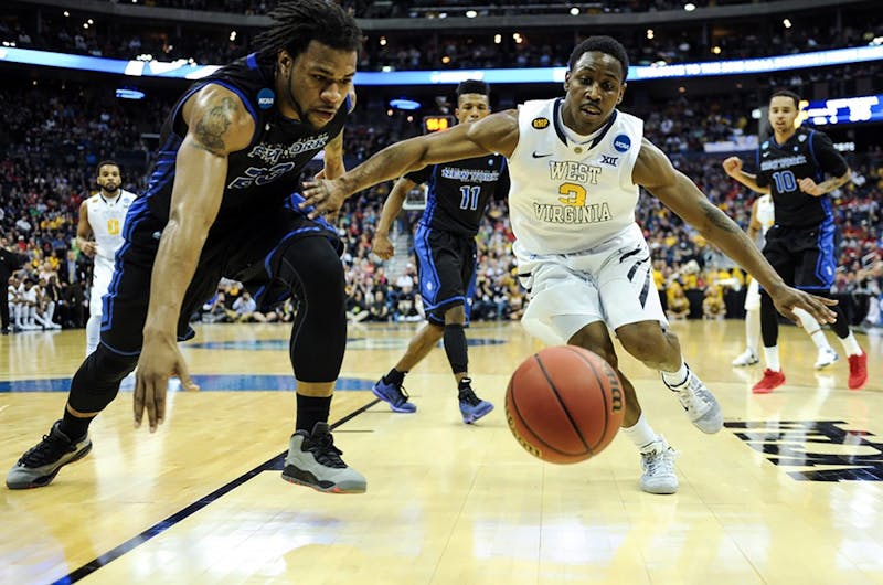 Justin Moss NCAA - The Spectrum