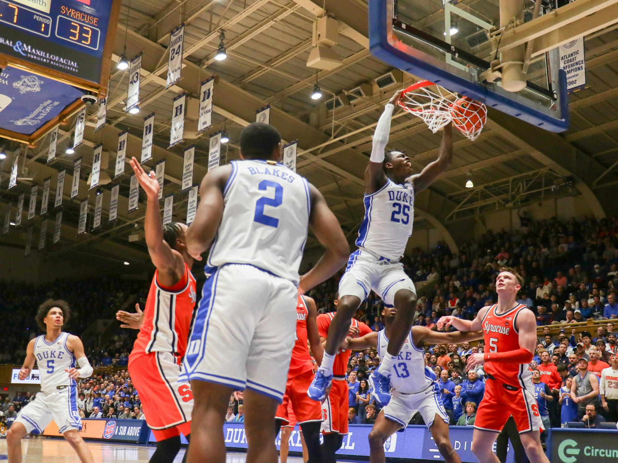 Supercharged by Mitchell, McCain, No. 14 Duke men's basketball sinks ...