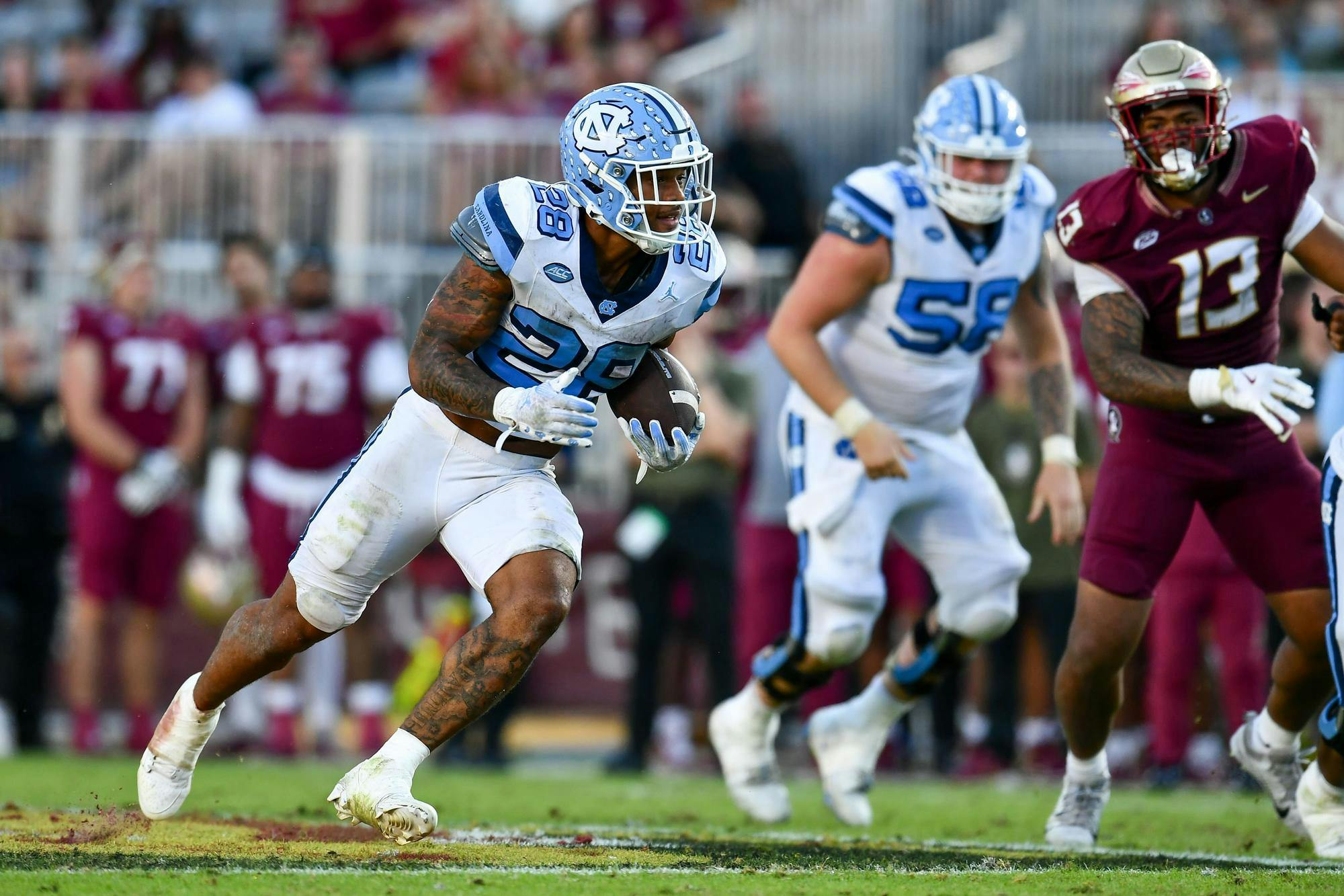 'Our best player': Omarion Hampton's five touchdowns carry Tar Heels to ...