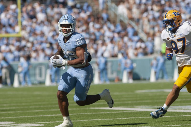 UNC football defeats Florida State, 35-11, led by Omarion Hampton's ...