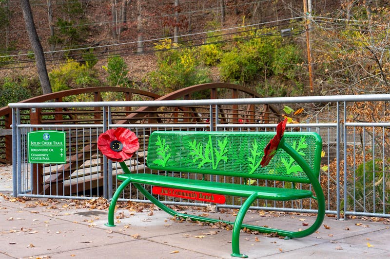 New bench on Bolin Creek Trail honors memory of Town employee Jim ...