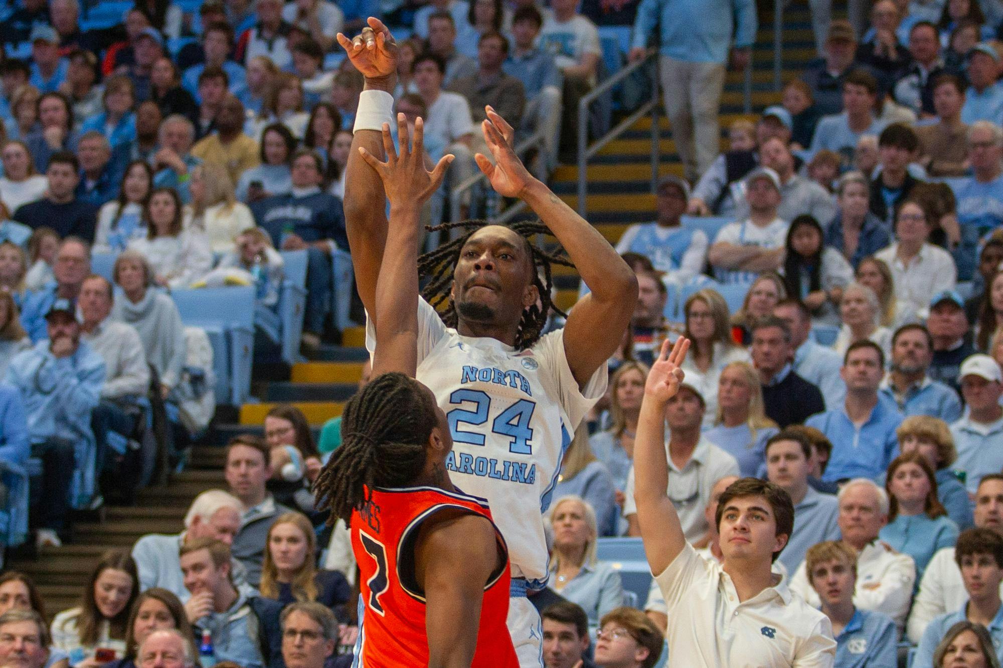 Jae'Lyn Withers' double-double lifts UNC men's basketball past Virginia ...