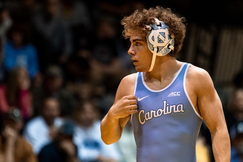 Spencer Moore leads UNC wrestling to 20-17 victory over Navy