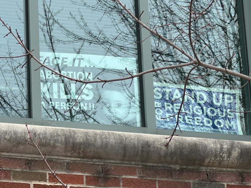 Anti-abortion posters displayed by EMU professor spark controversy ...