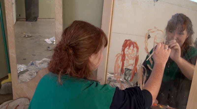 Body image reflected through a mirror - Elon News Network