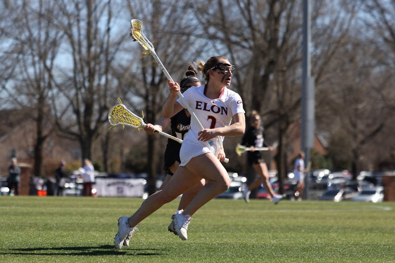 Elon University lacrosse team falls short in overtime to Virginia ...