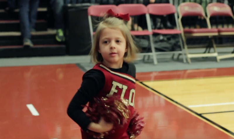 Coach Matheny's daughter cheers Men's Basketball team to victory - Elon ...