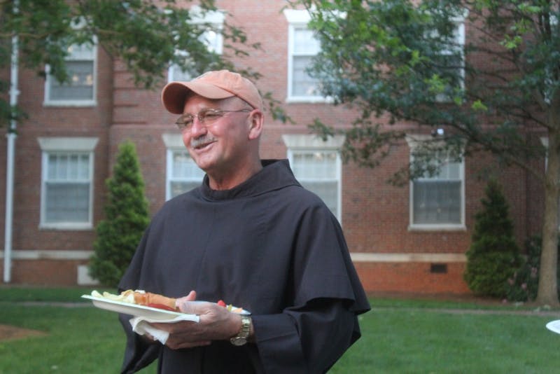 Father Gerry Waterman bids farewell to Elon - Elon News Network