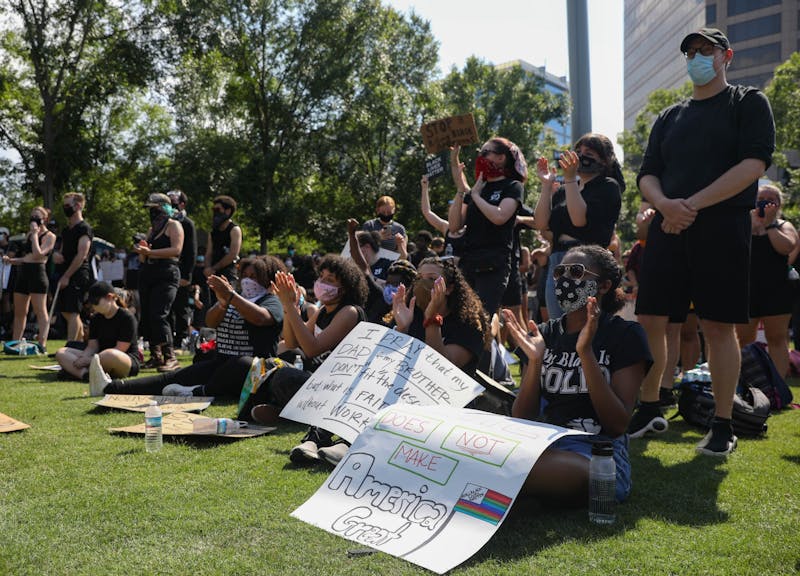 Elon students join protests against police brutality in Greensboro ...