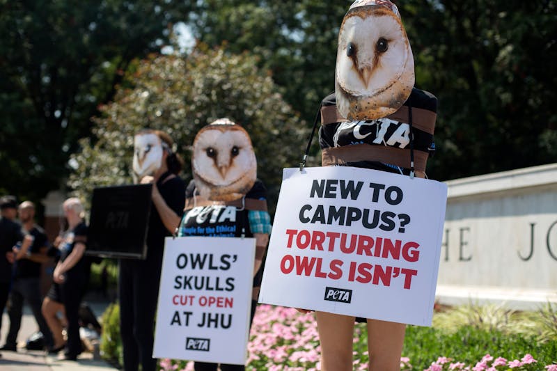 PETA stages protest against Hopkins owl lab at Orientation - The Johns ...