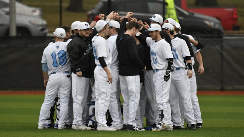 Baseball splits in a double header to open season - The Johns Hopkins ...