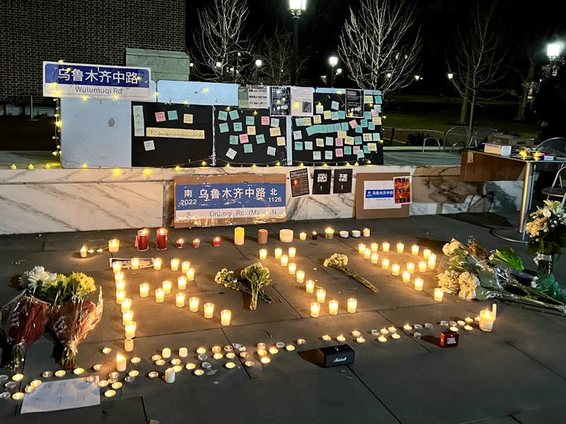 Students hold vigil for victims of Urumqi fire to show solidarity with ...