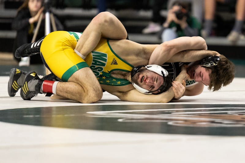 Wrestling: NIU overcomes early deficit to defeat Ohio - The Post