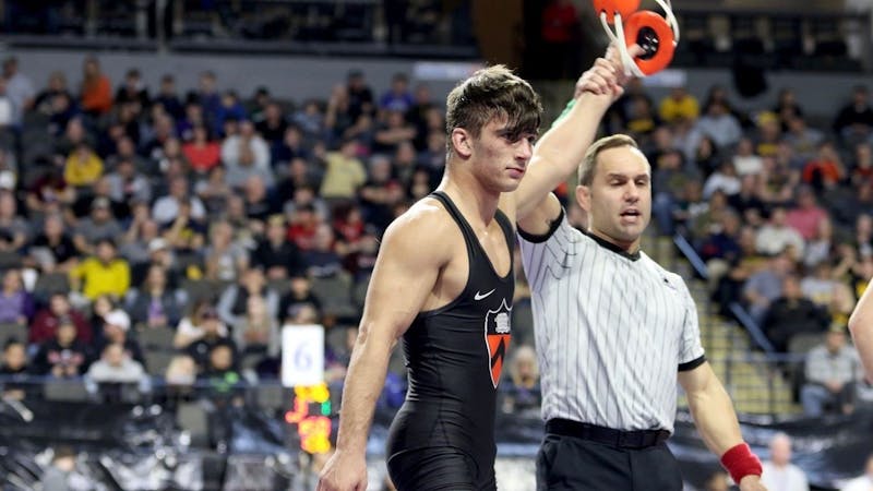 ‘Back out on the mat’: Wrestler Pat Glory ’23 competes through gap year ...