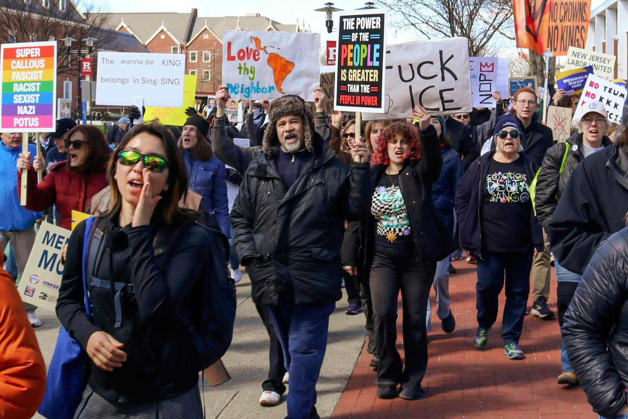 U. students, faculty, activists hold No Kings 3 protest on College Ave ...