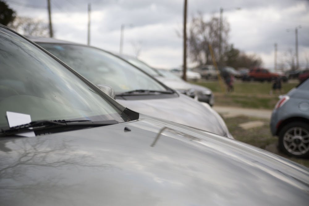 Four students to begin enforcing parking - The Rotunda