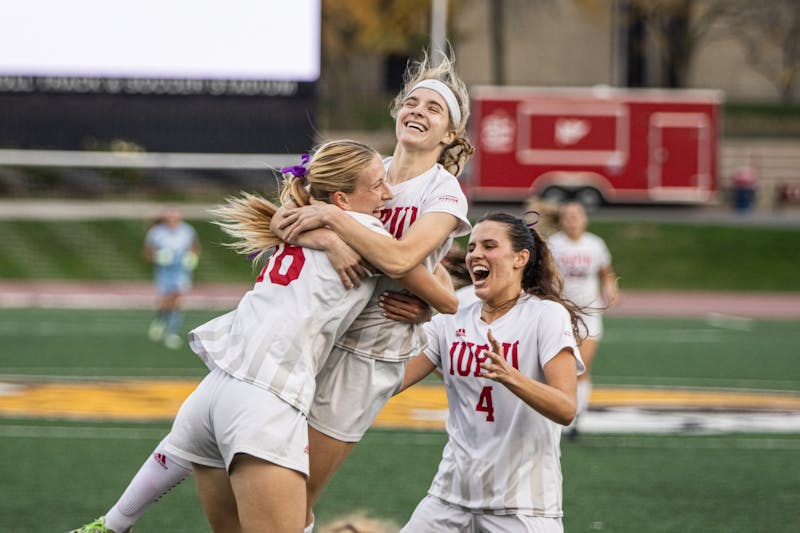 Senior Emma Antoine celebrates with Seniors Sam Slimak and Carlie ...