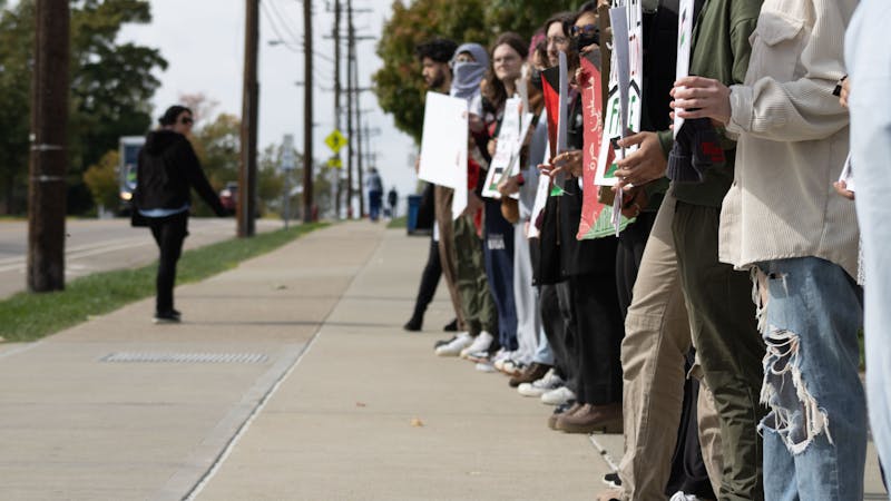 Students silently protest the Palestine and Israel conflict at Miami ...