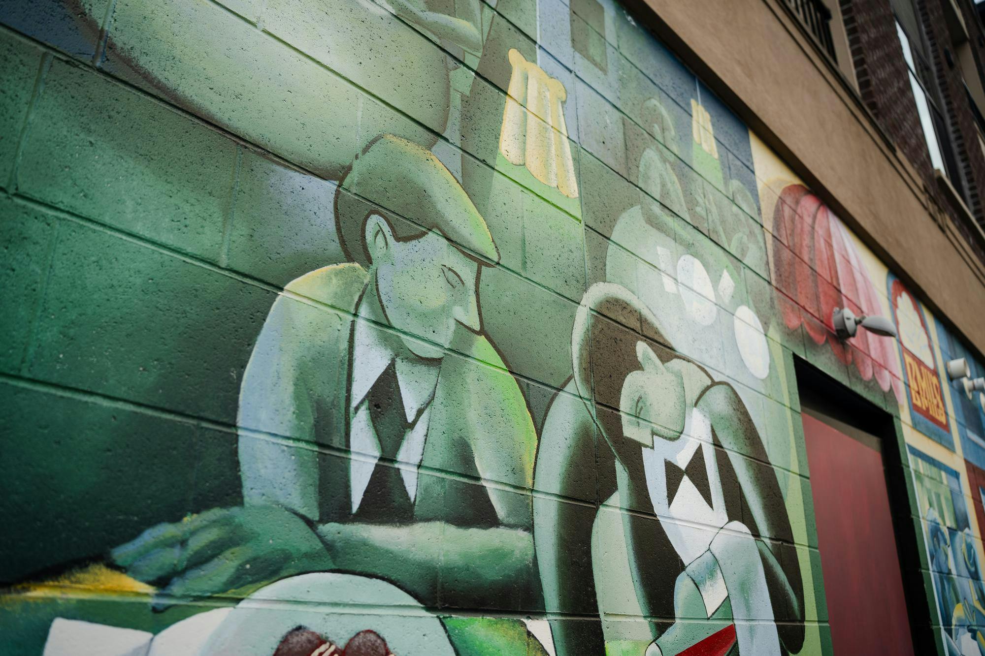 Local artist brightens Lansing with murals - The State News