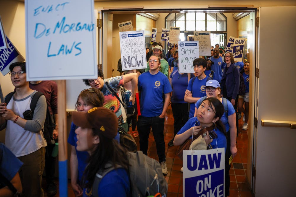 ASEs initiate sit-in inside of Gerberding Hall following rally on Red ...