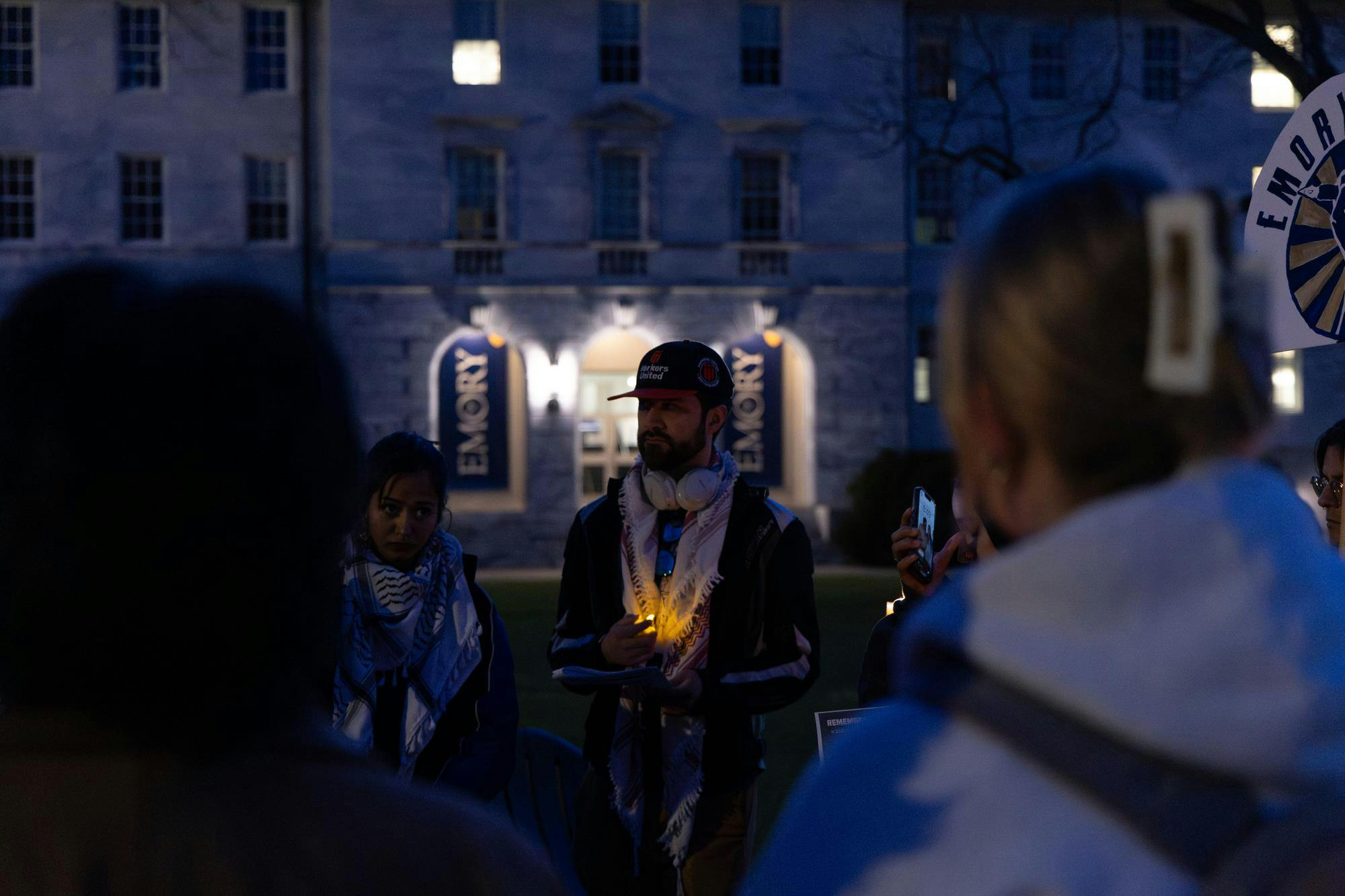 Community members honor ICE victims at vigil - The Emory Wheel